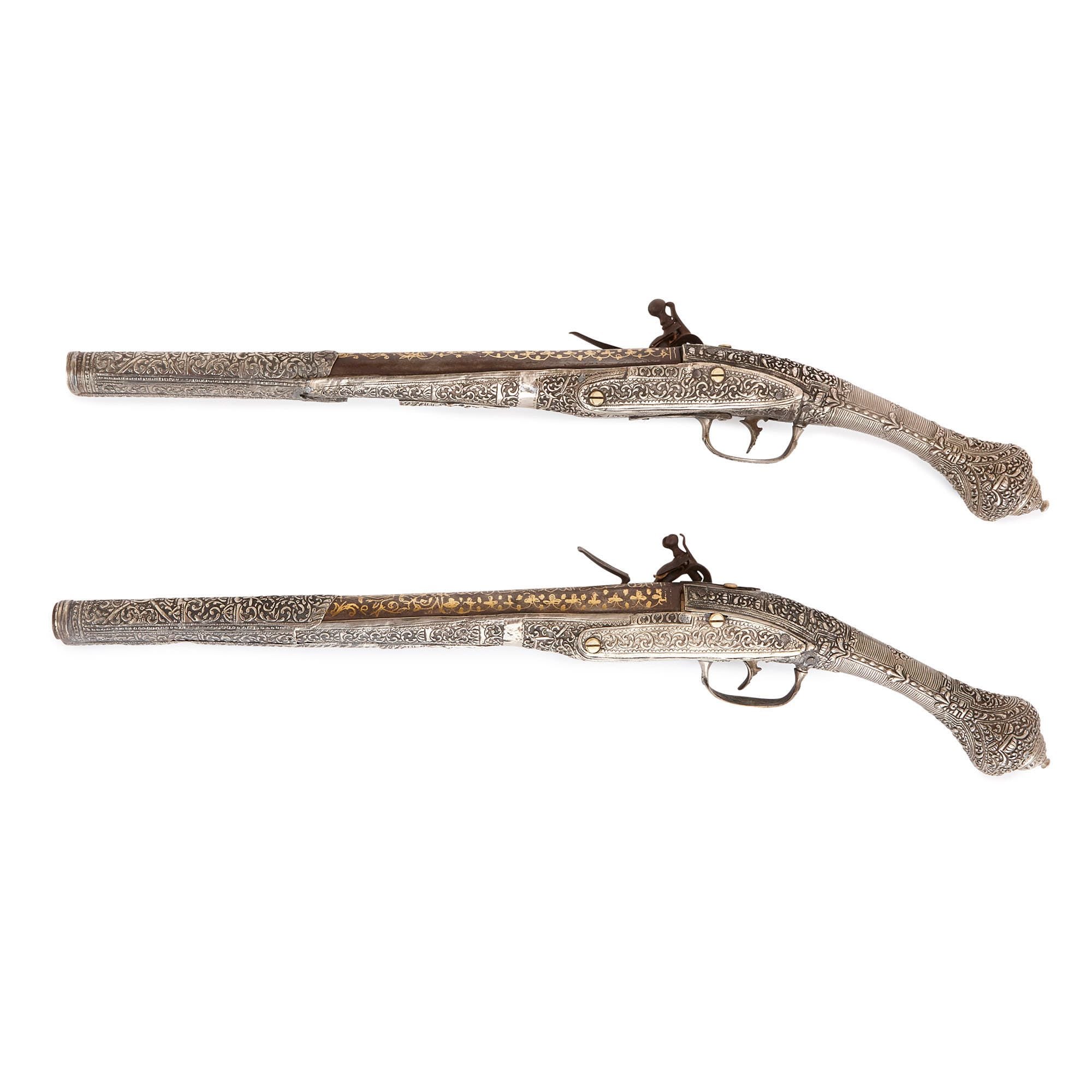 Pair of Balkan silver and gold-damascened flintlock pistols | Mayfair ...