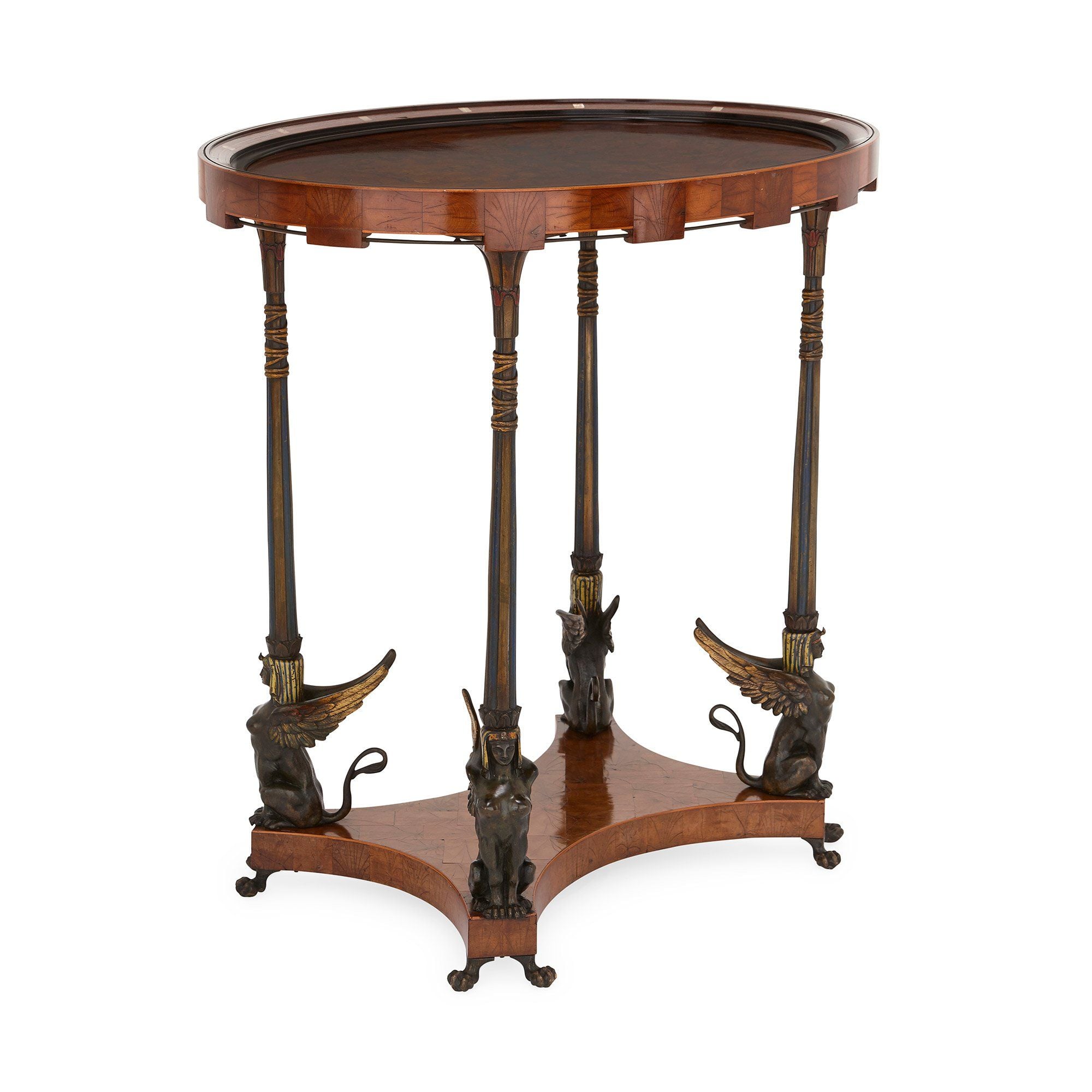 Egyptian revival style walnut and mahogany oval side table | Mayfair Gallery