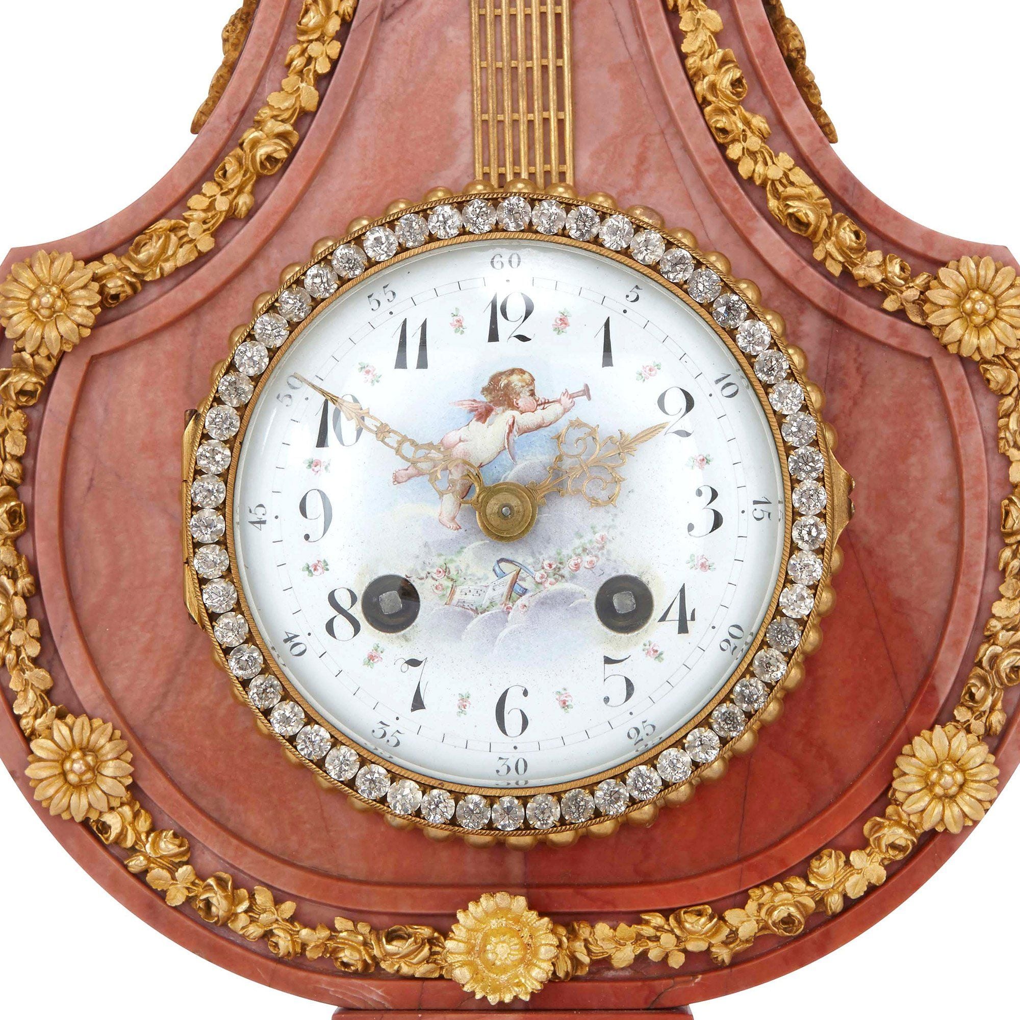 Neoclassical style ormolu mounted pink marble clock set | Mayfair Gallery