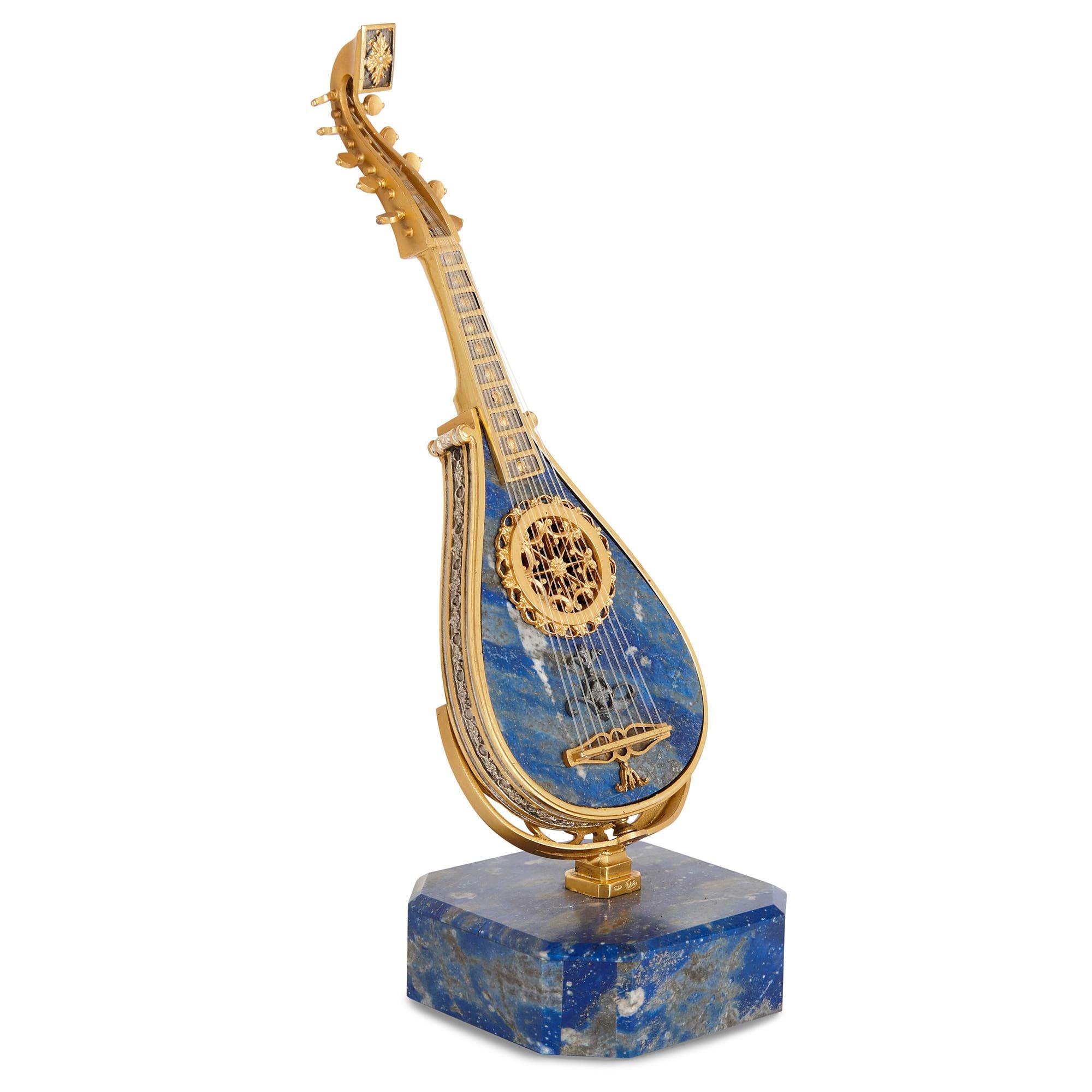 Set of semi-precious stone and silver-gilt miniature instruments ...
